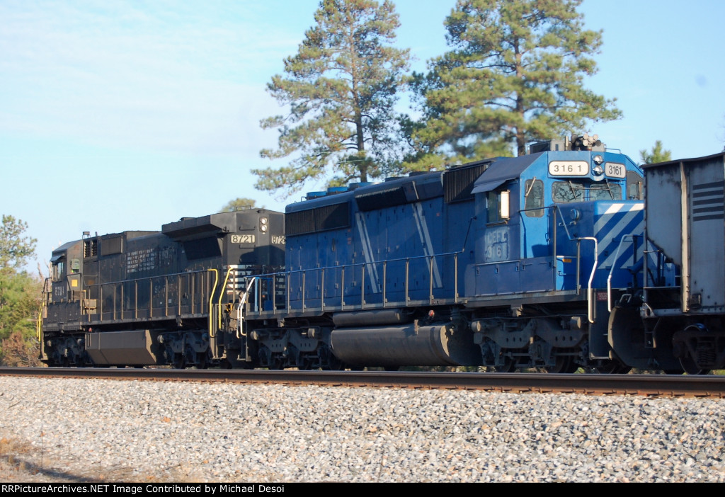 CEFX SD-40-2 #3161 is 2nd out on this empty westbound hopper train that just crossed Ecella Rd.